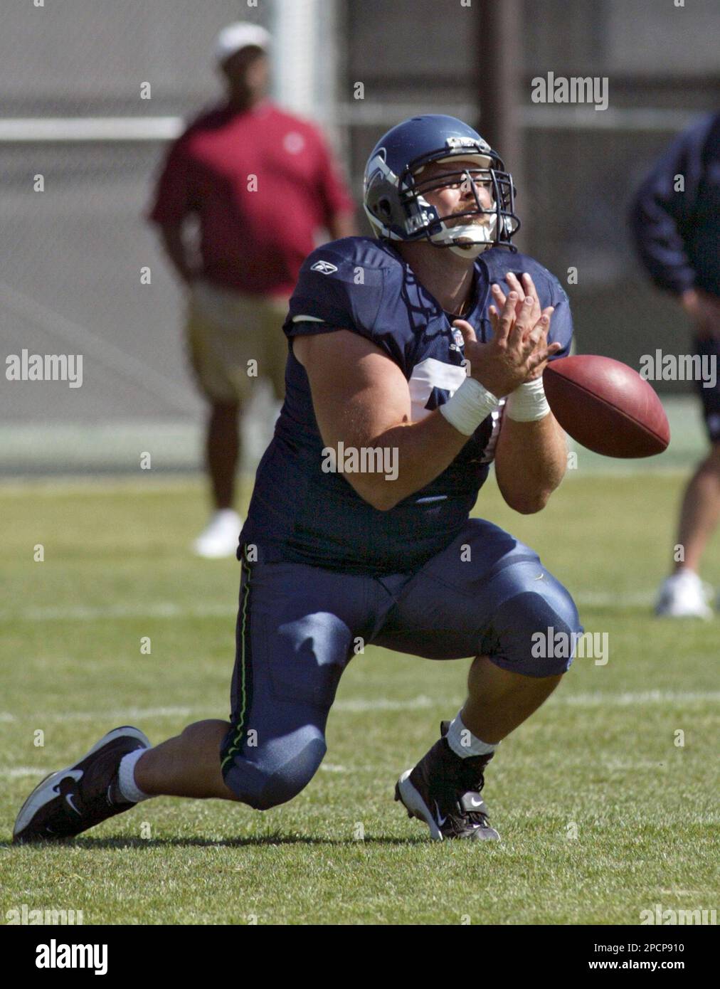 Seattle Seahawks center Robbie Tobeck fumbles a punt during football ...