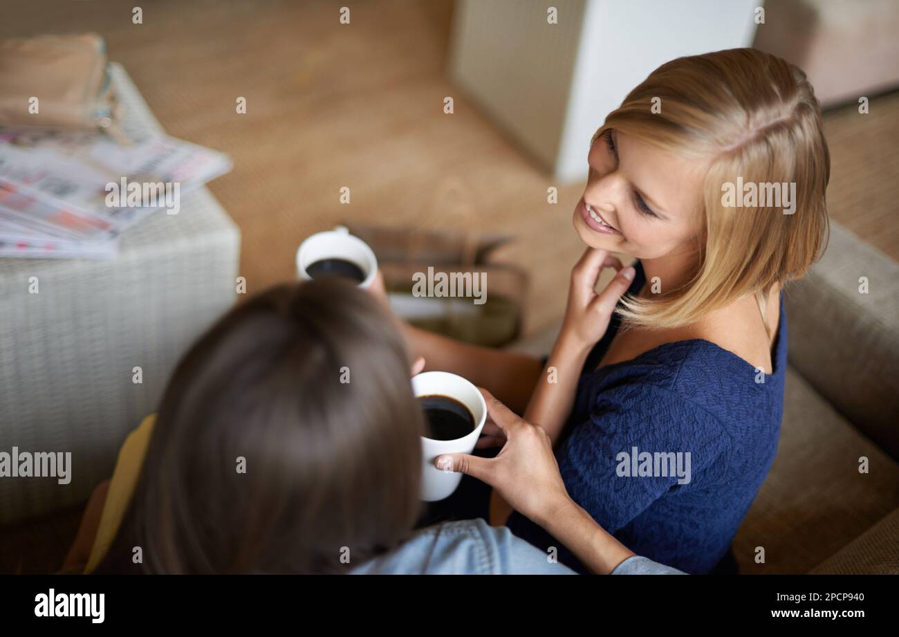 Catching up with old friends. Two gorgeous friends enjoying some coffee ...