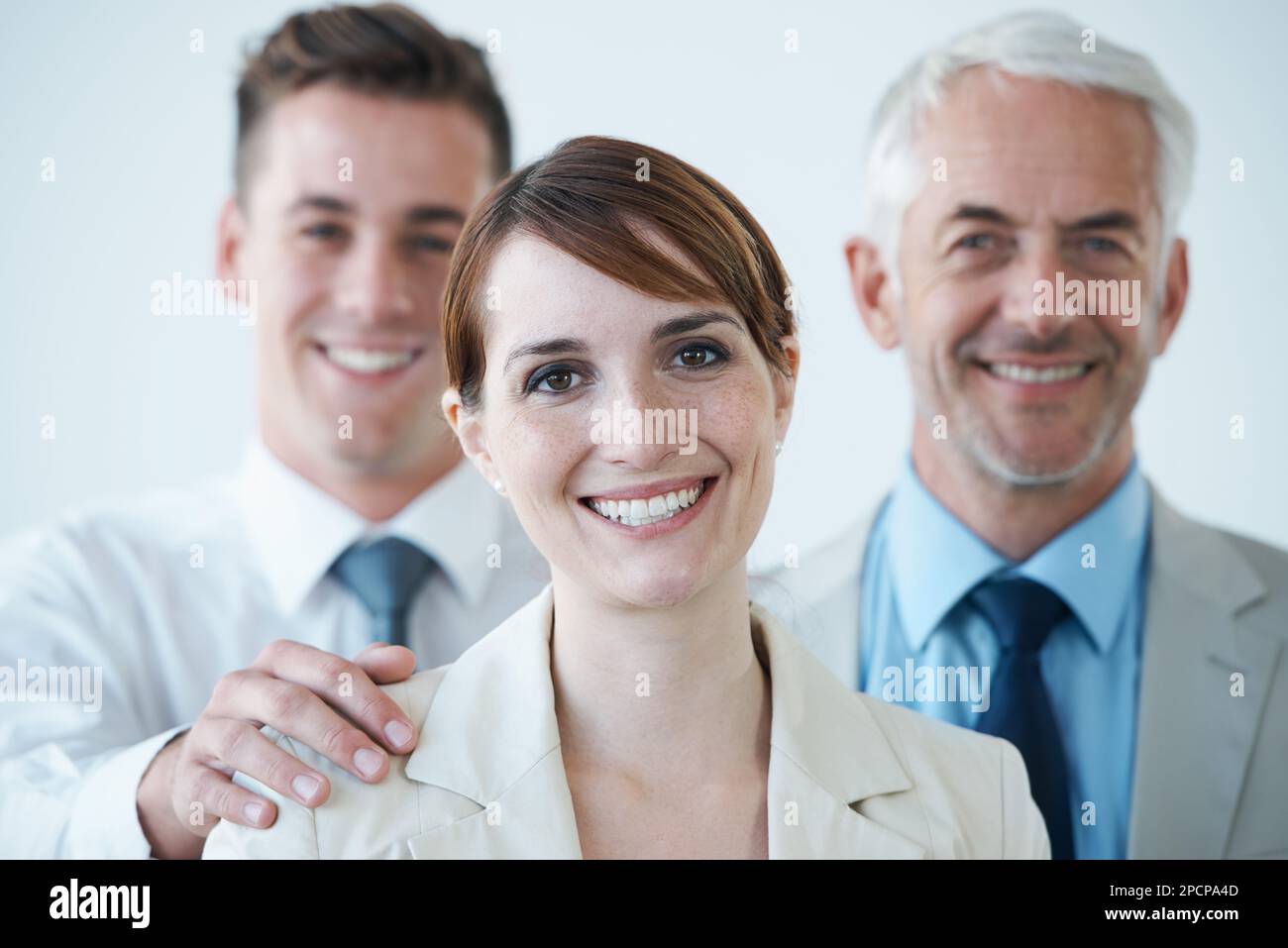 We work well together. Portrait of a group of smiling business people ...