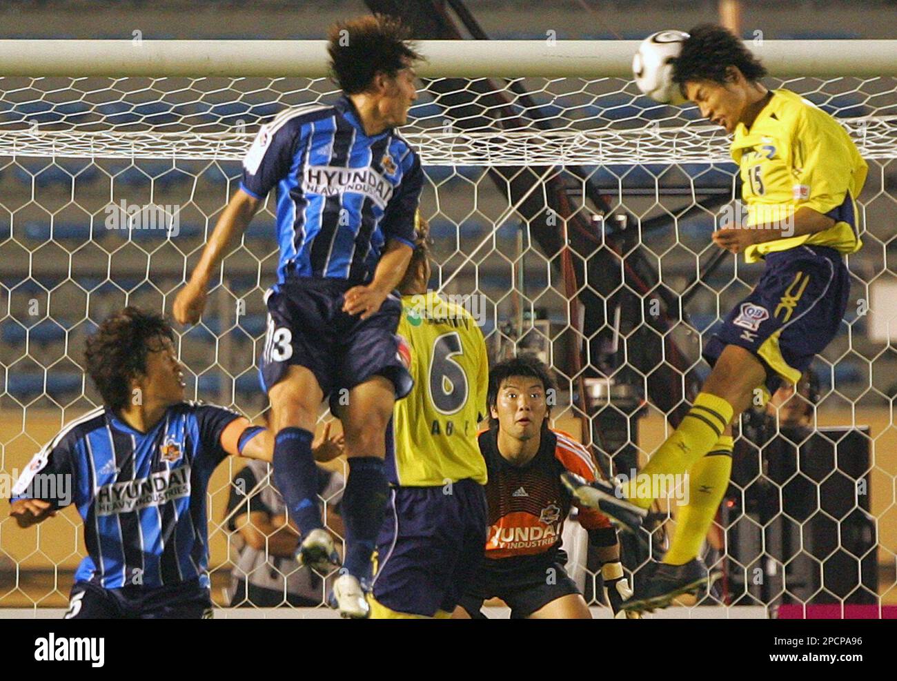 Japan's Jef United Chiba Koji Nakajima, right, scores a goal against ...