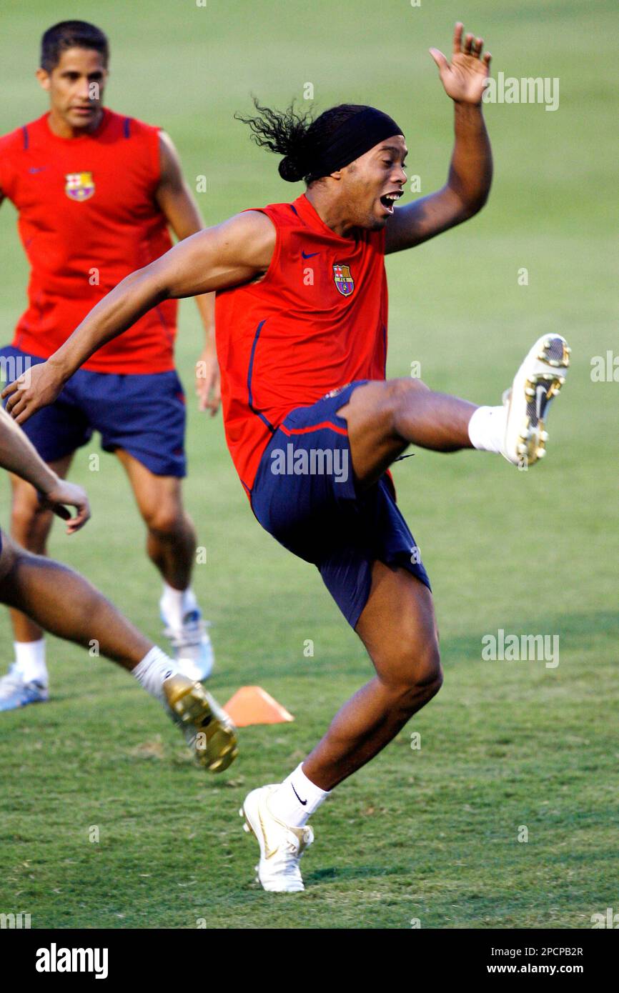 Spain's FC Barcelona soccer player Ronaldinho from Brazil runs drills ...
