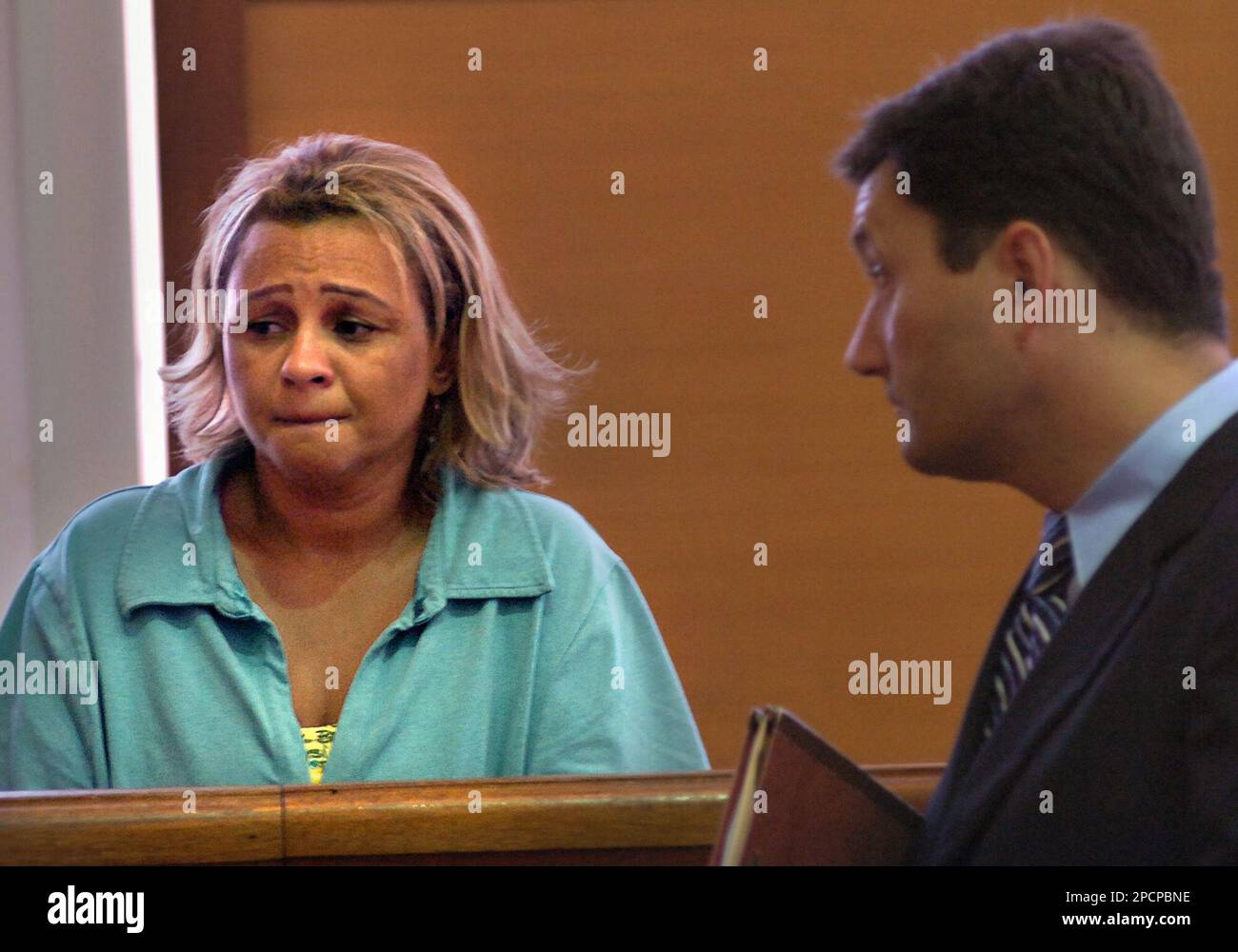 Ana Celia Pena Sielemenn stands during arraignment Tuesday, Aug. 1 ...