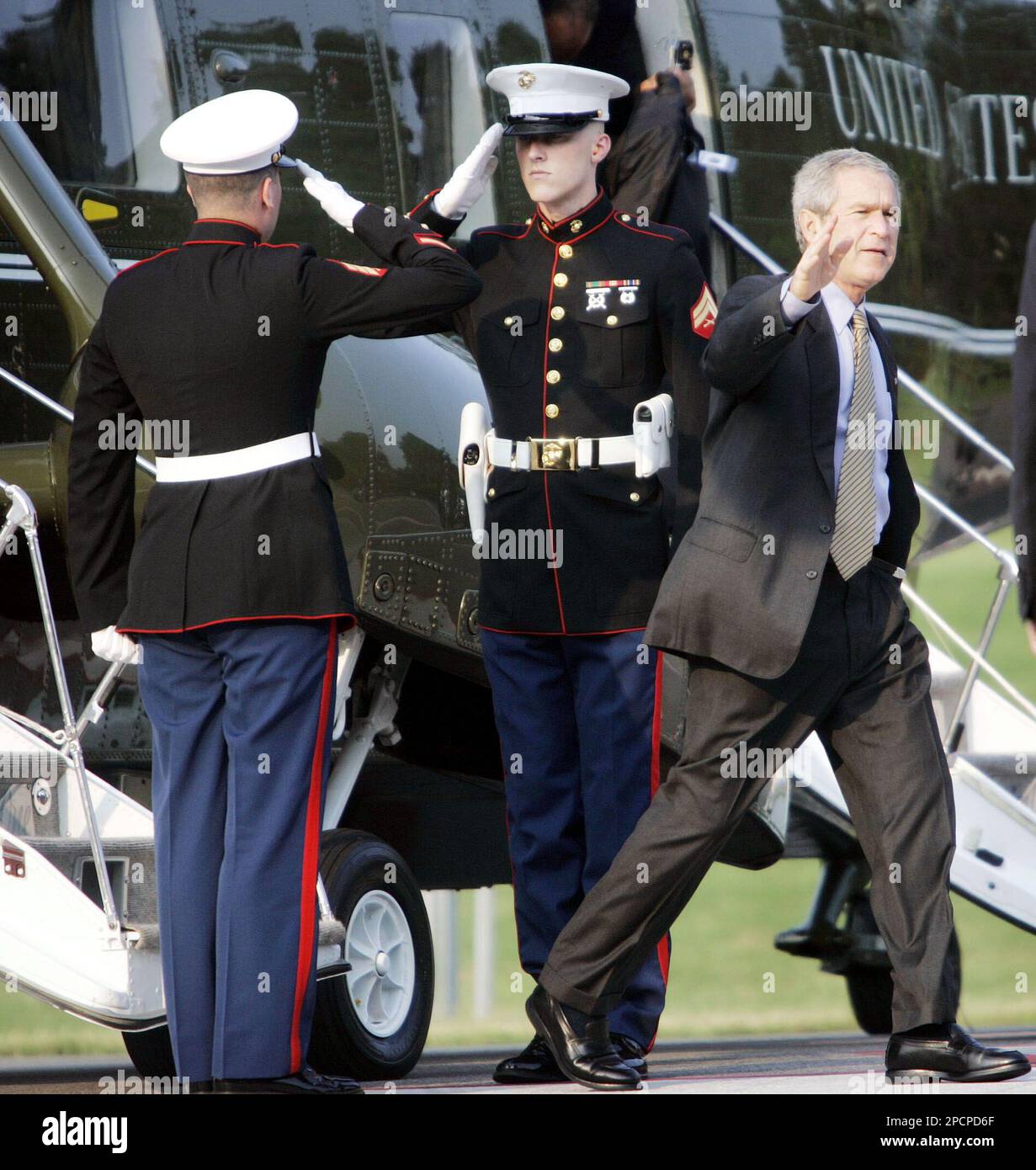 President Bush steps off Marine One at the landing zone at National ...