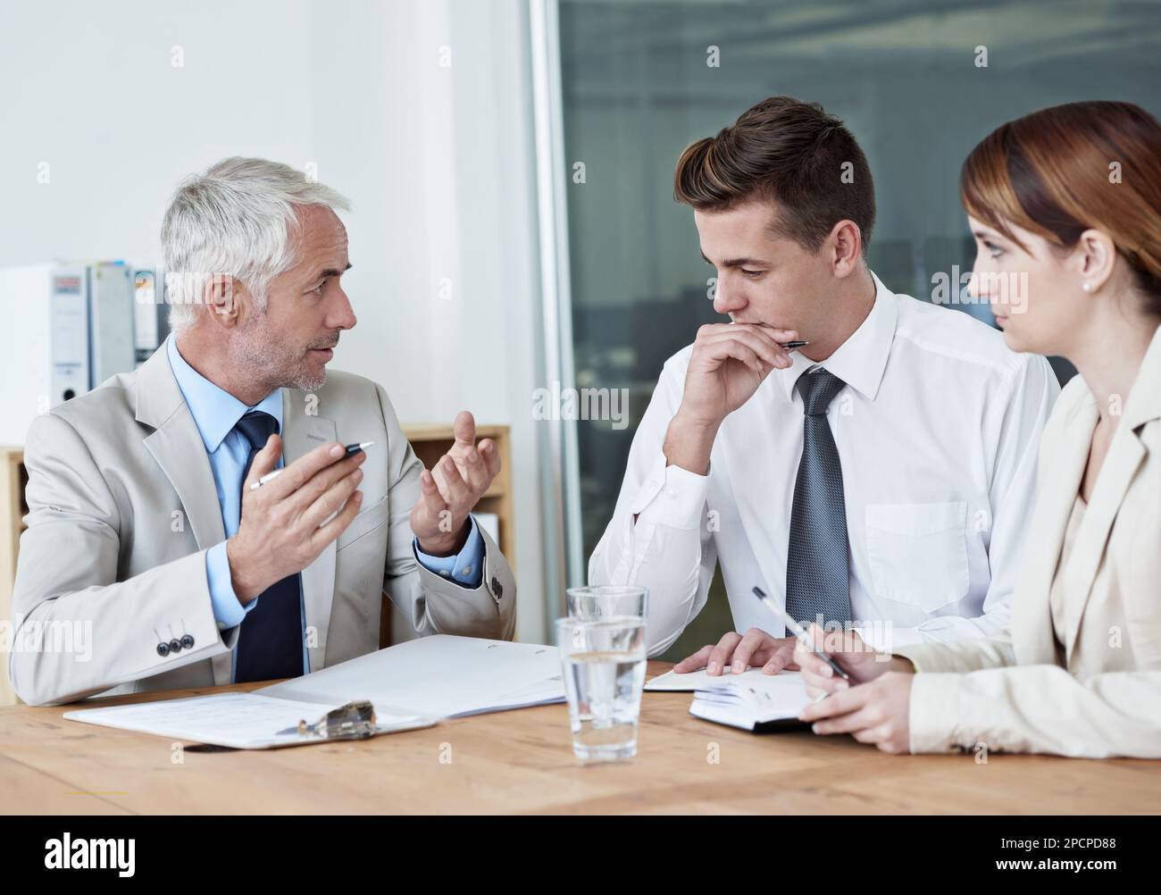 Hes got years of corporate experience. a group of colleagues having a ...