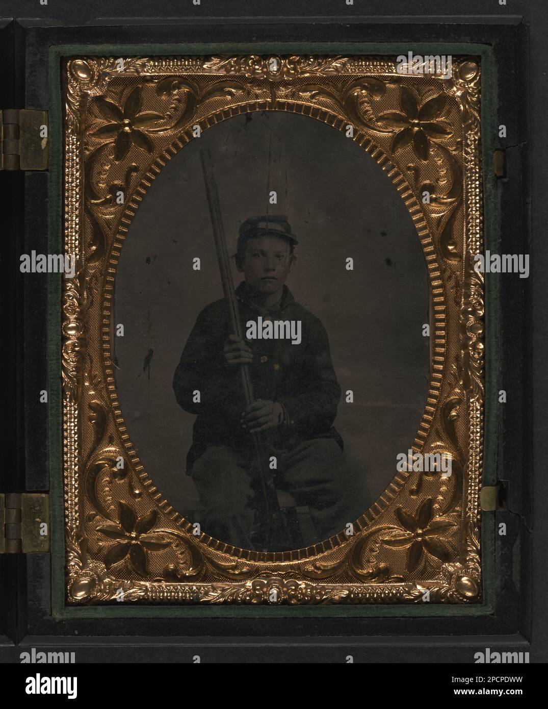 Unidentified young soldier in Union shell jacket and kepi with musket ...