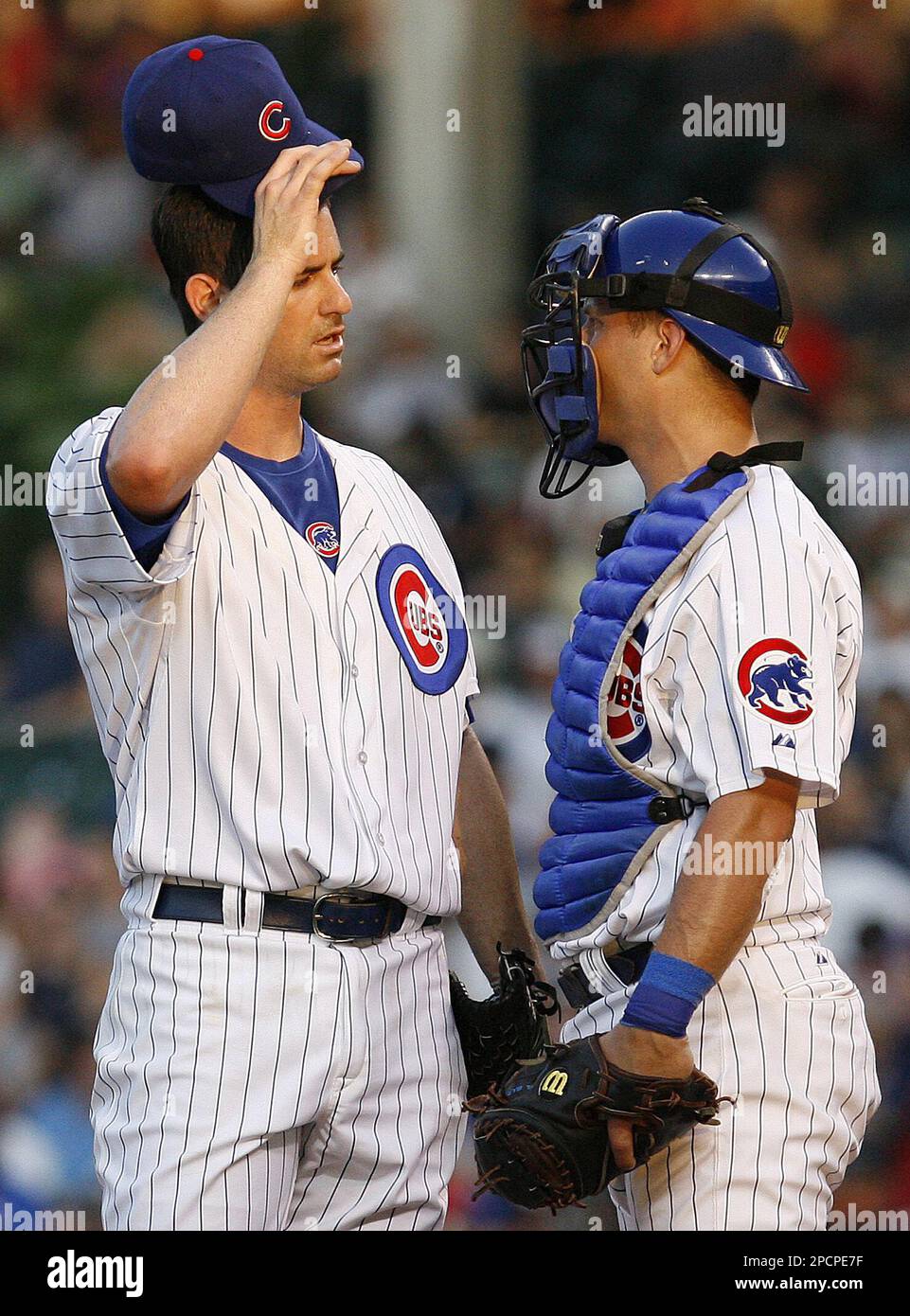 Chicago Cubs catcher Michael Barrett, right, talks to pitcher Mark ...