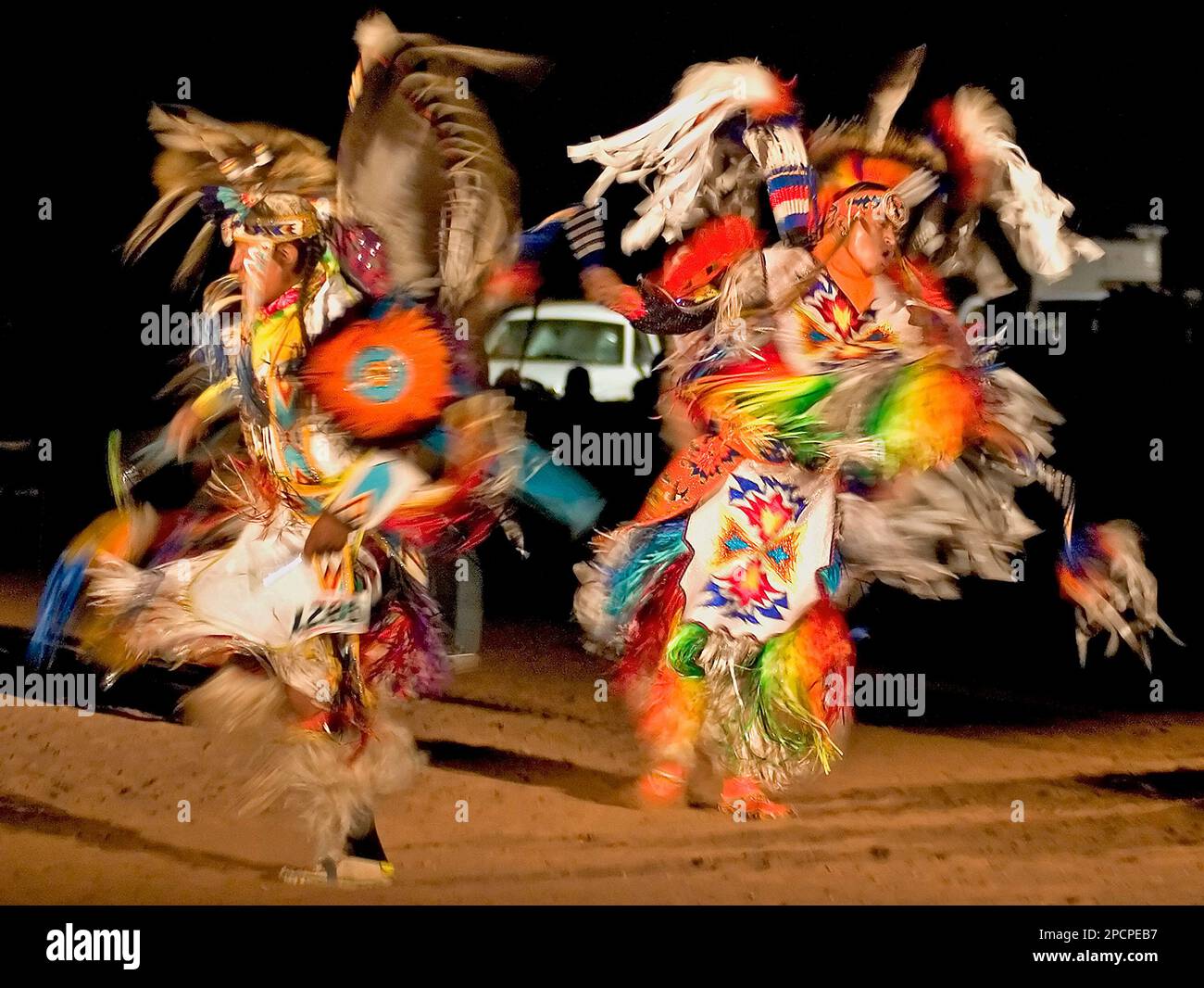 Rudy Bob, left, and Chaz Tailbears perform in the Group Spotlight Fancy ...