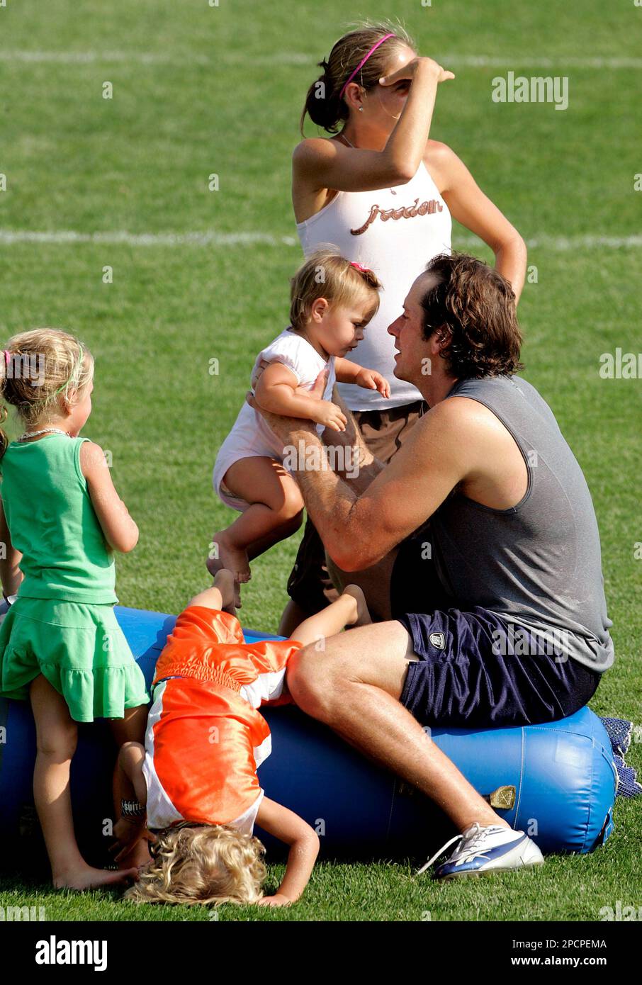 New England Patriots punter Josh Miller sits on a blocking dummy ...