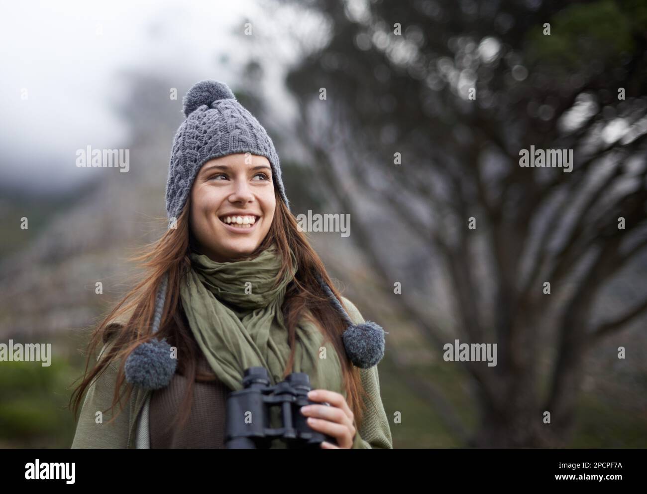 Out for a hike on a crisp morning. A gorgeous brunette going for a hike ...