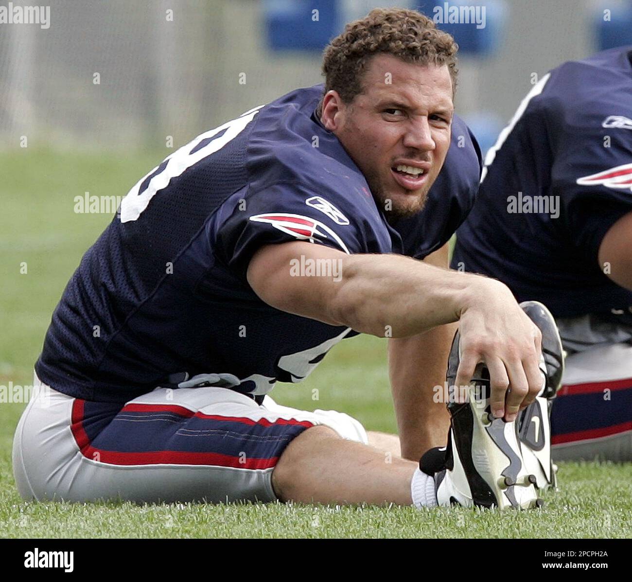 New England Patriots linebacker Chad Brown stretches during the team's ...
