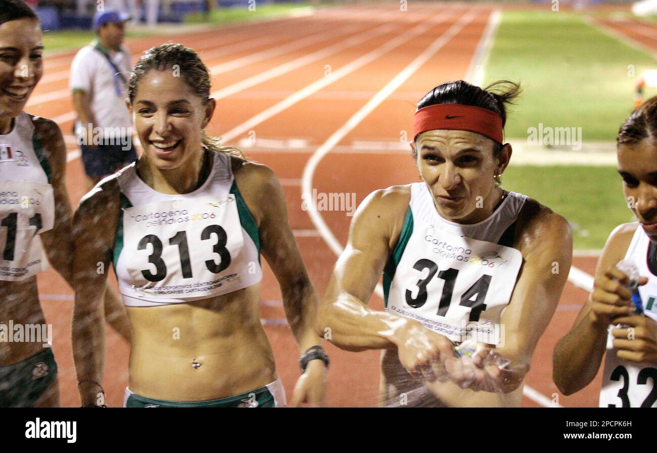 Members of Mexico's team, that won the gold medal, react after their ...