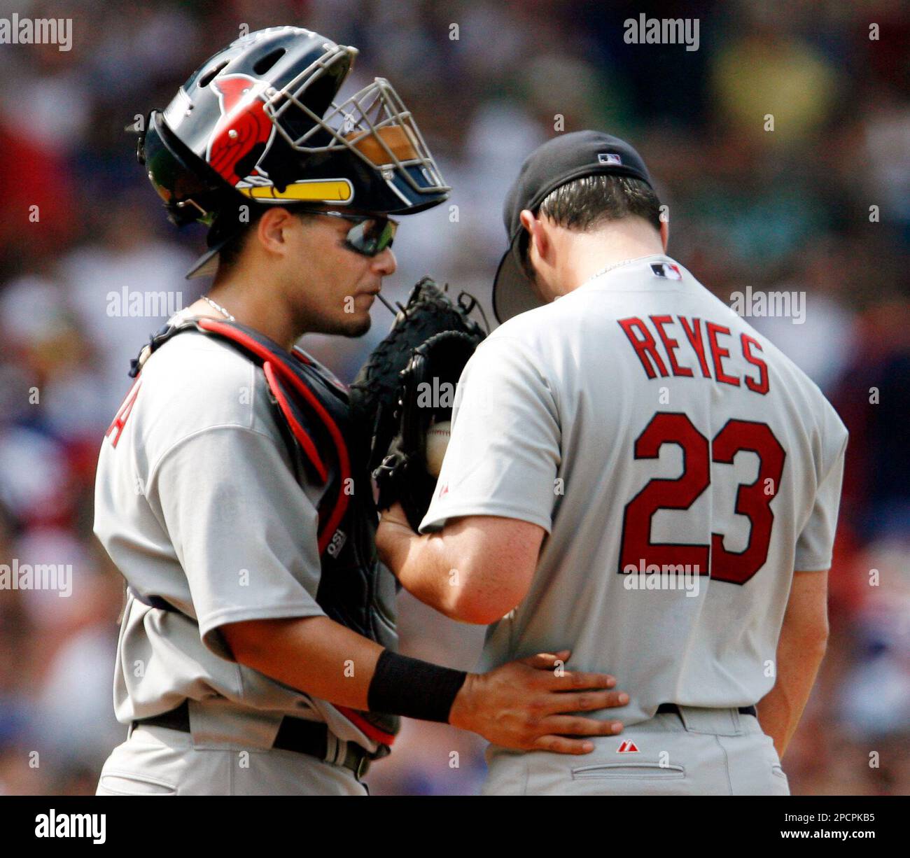 St. Louis Cardinals catcher Yadier Molina talks with pitcher Anthony ...