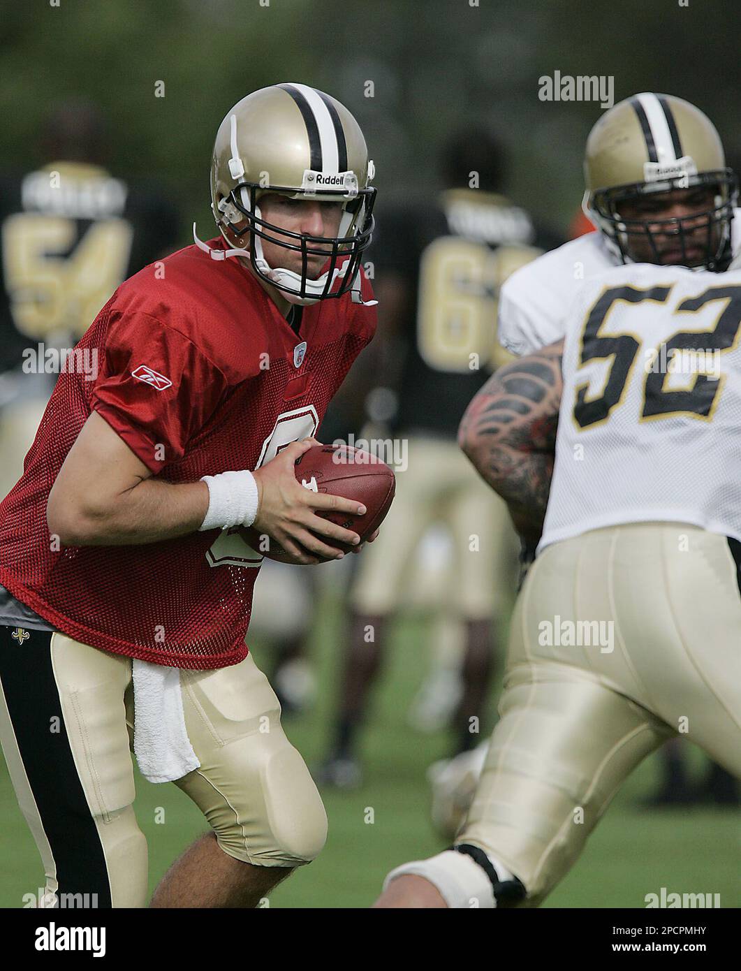 New Orleans Saints quarterback Drew Brees follows the block of center ...