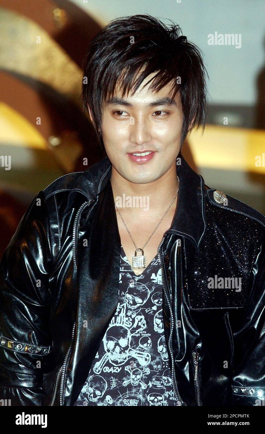 South Korean singer Kangta performs for Hong Kong fans in a mall on ...