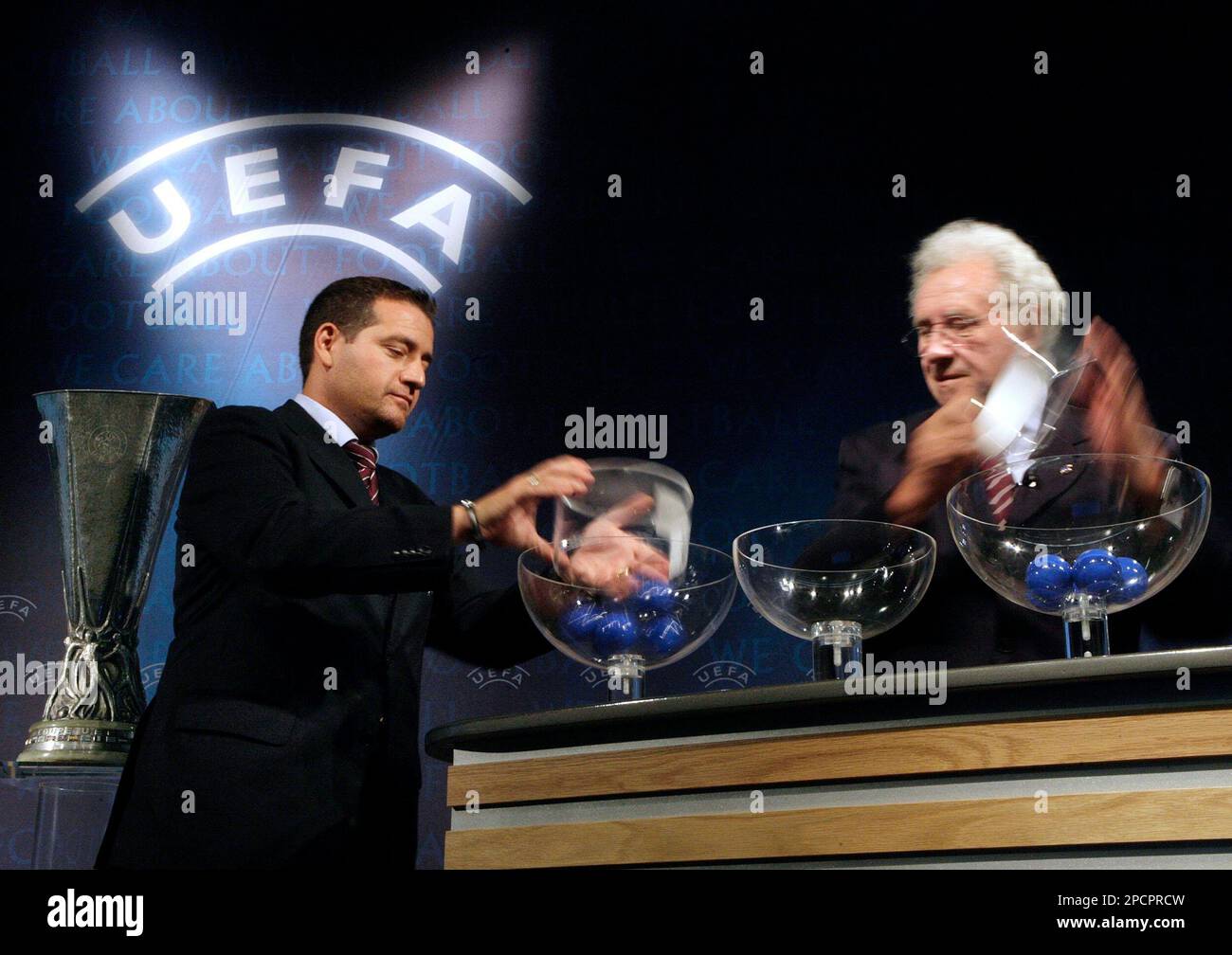 An UEFA staff member, left, and UEFA representative Jean Fournet-Fayard ...