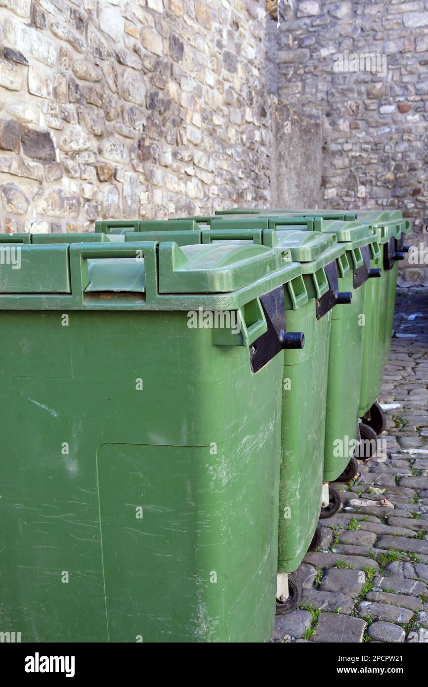 A group of dumpsters in a street Stock Photo - Alamy