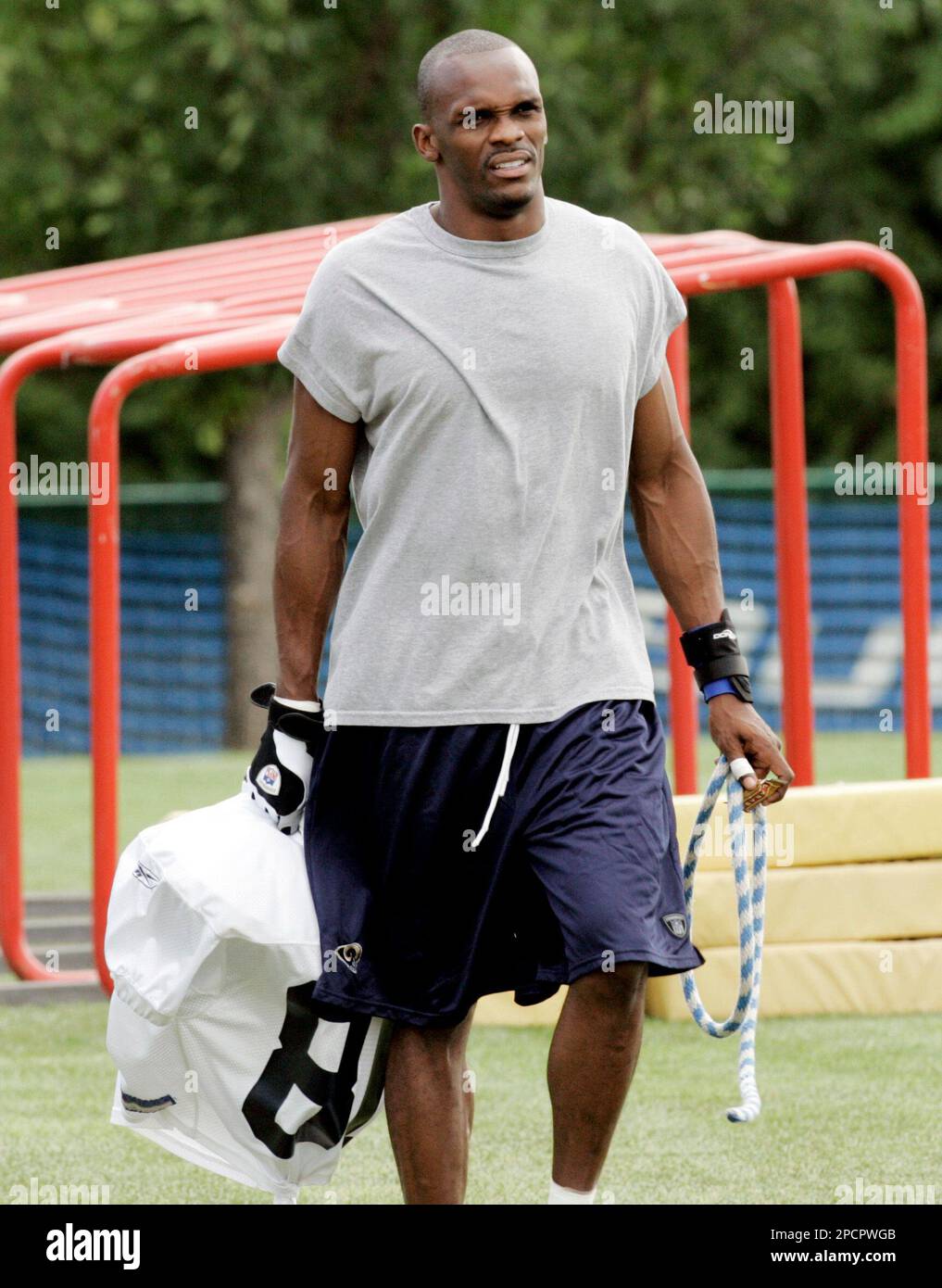 St. Louis Rams wide receiver Isaac Bruce heads to the first practice of ...