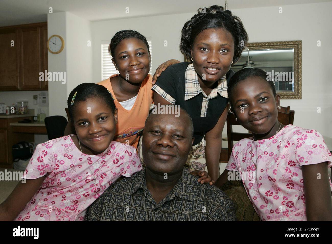 Joseph Mataley and his four daughters, from left, Susana, Josephine ...