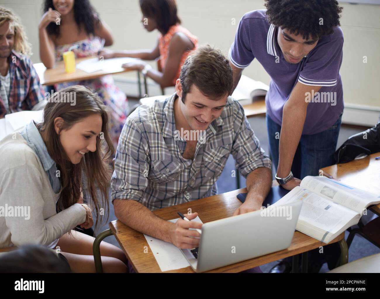 College students using laptops in class hi-res stock photography and ...