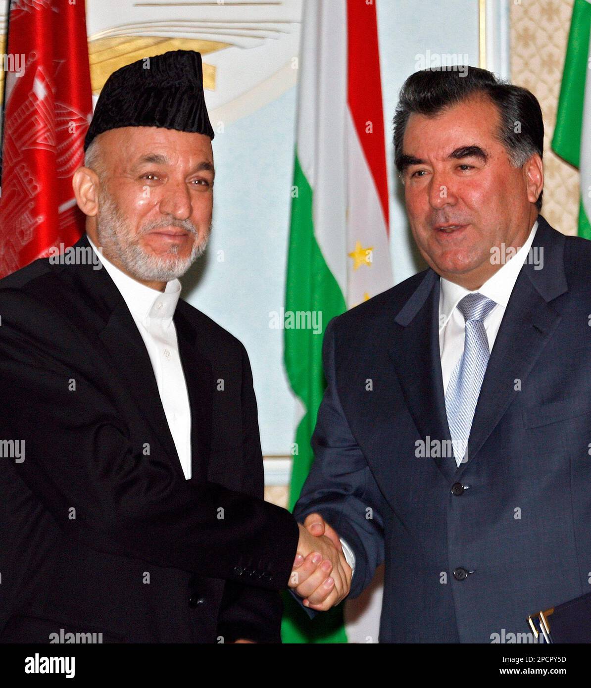 Visiting Afghan President Hamid Karzai, left, and Tajik President ...