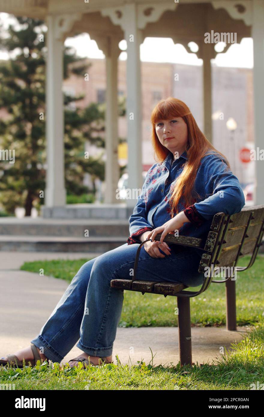 Jessica Orsini sits in the park Thursday, July 13, 2006, in downtown ...