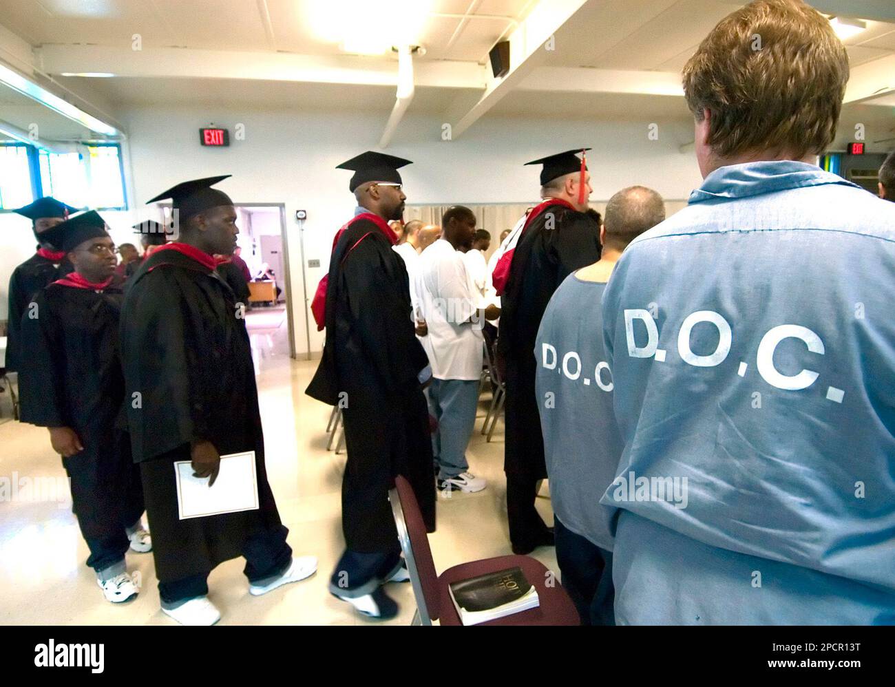 Graduates in the Covenant Theological Seminary march in to the prison ...