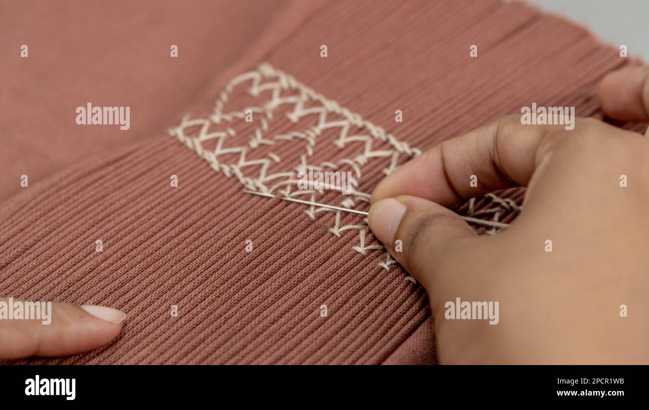 Smocking hi-res stock photography and images - Alamy