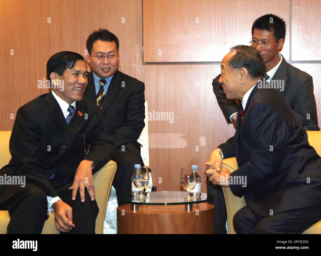 China Foreign Minister Li Zhaoxing, right, speaks to his Myanmar's ...