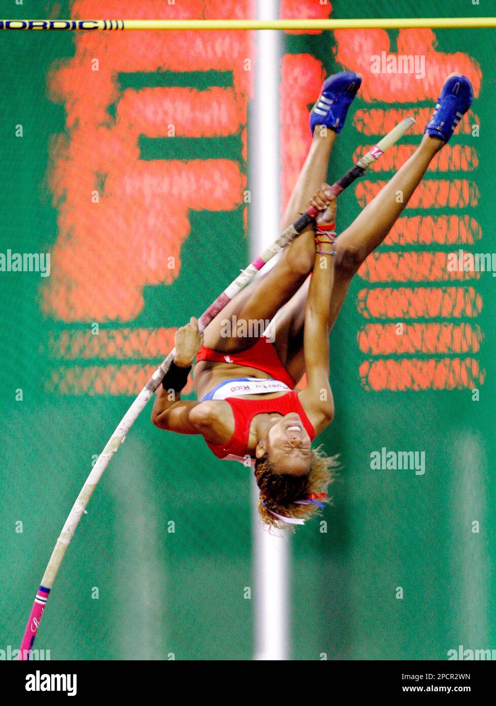 Alexandra Gonzalez of Puerto Rico wins the bronze medal in the pole ...