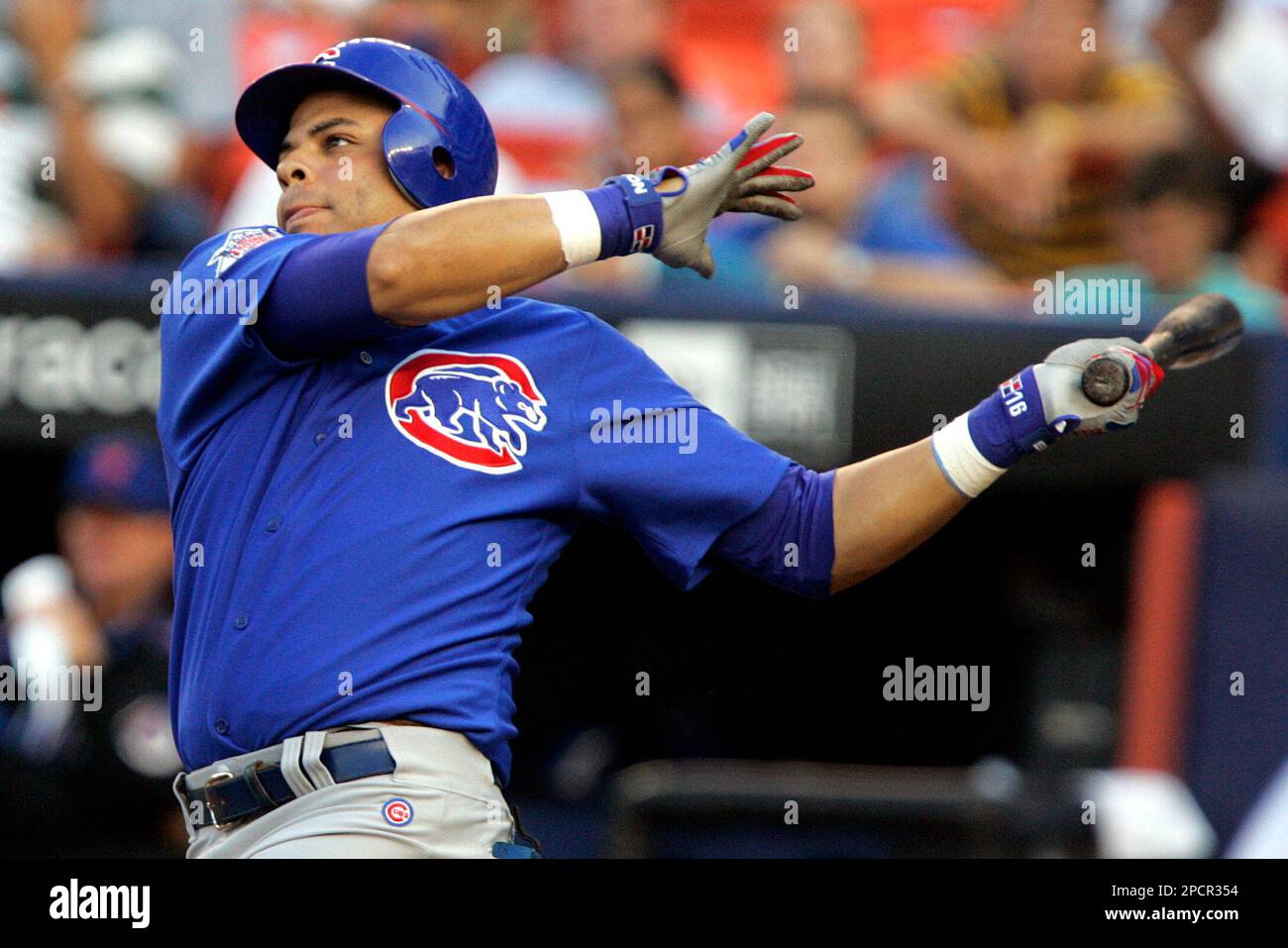 Chicago Cubs' Aramis Ramirez follows through on a home run during the ...