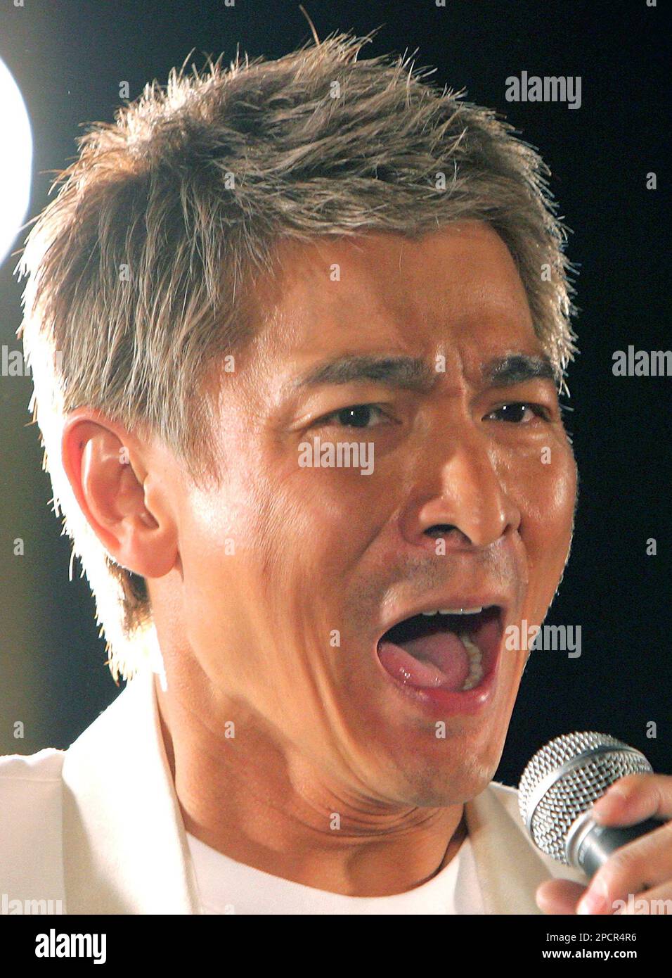 Hong Kong star Andy Lau sings during his special concert in Tokyo ...