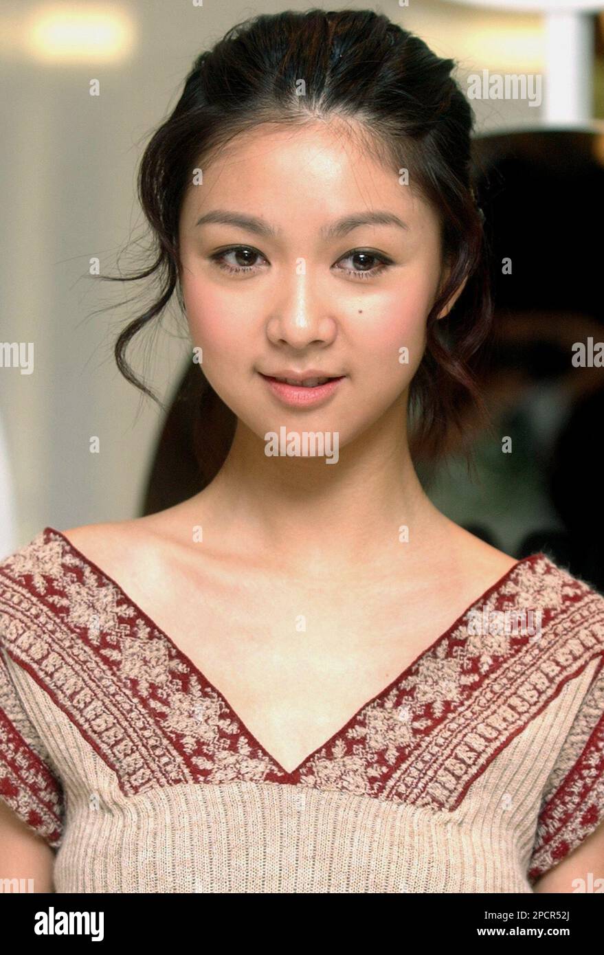 Hong Kong singer-actress Fiona Sit beams during an opening ceremony of ...