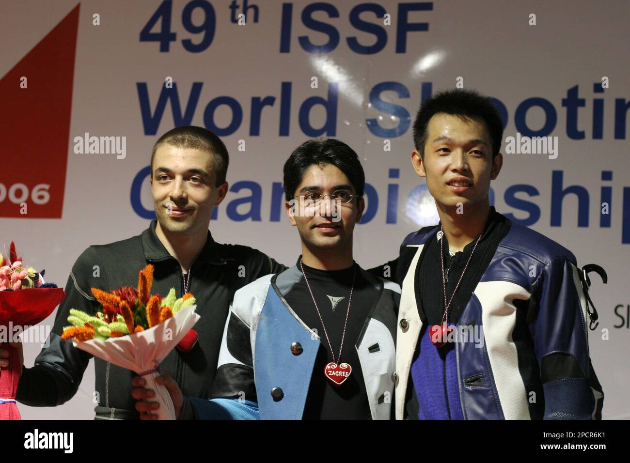 Alin George Moldoveanu of Romania, left, Abhinav Bindra of India ...