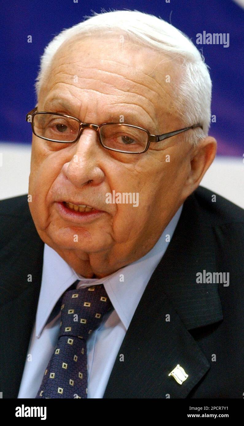 FILE *** Israeli Prime Minister Ariel Sharon speaks to members of his ...