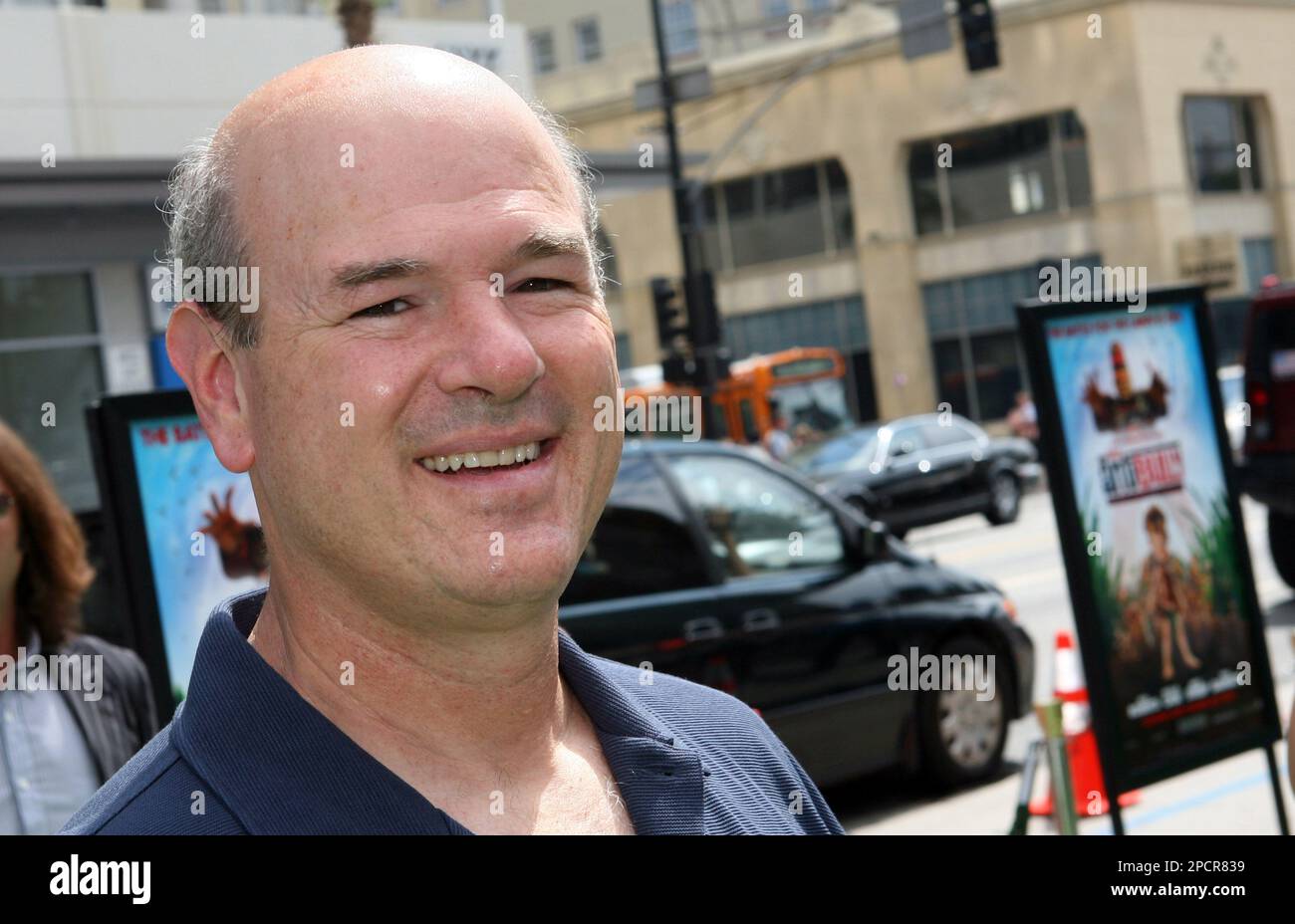 Larry Miller, of "The Ant Bully," poses for photographers as he arrives ...