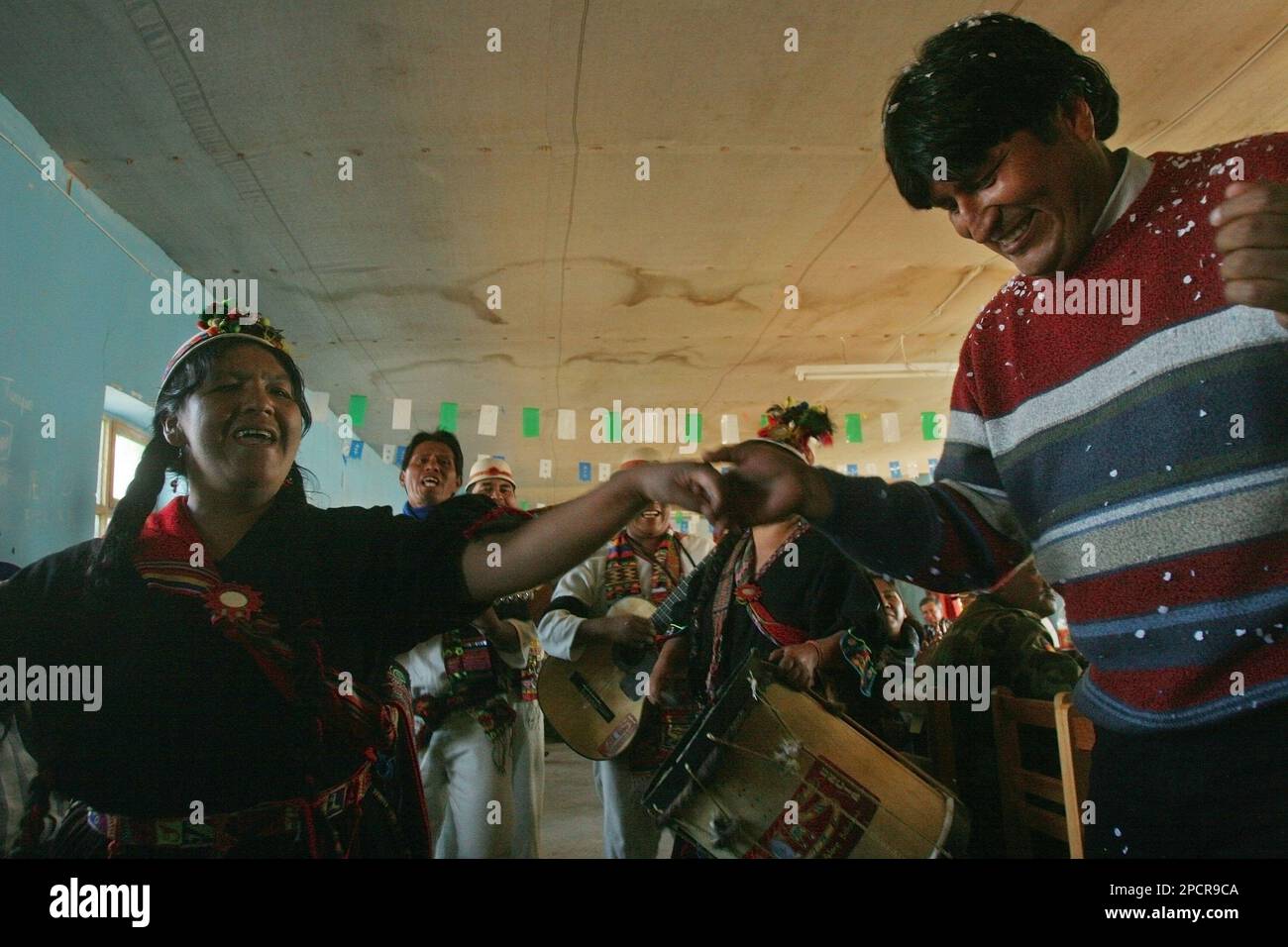 Bolivian president Evo Morales dances Bolivian folk music as he is ...