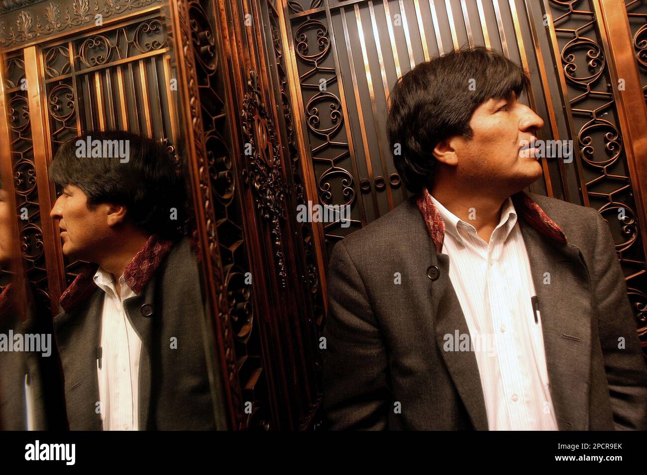 Bolivian President Evo Morales descends on an antique elevator at the ...