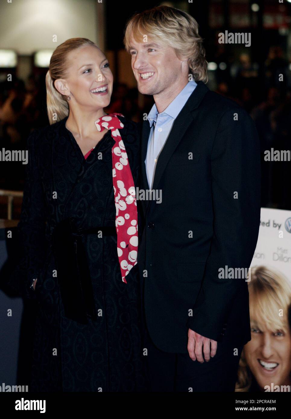 U.S. actors Kate Hudson, left, and Owen Wilson pose for photographers ...