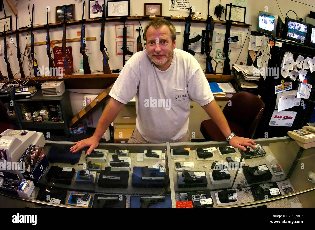 Richard Taylor, owner of D&R Arms, in Portsmouth, Va., is shown ...