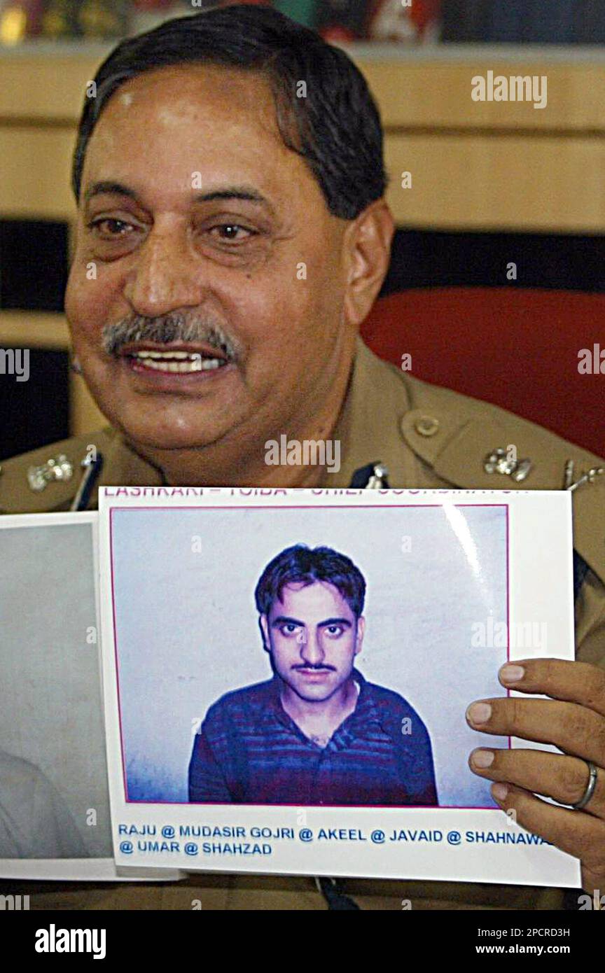 Director General of Jammu and Kashmir Police Gopal Sharma displays the ...