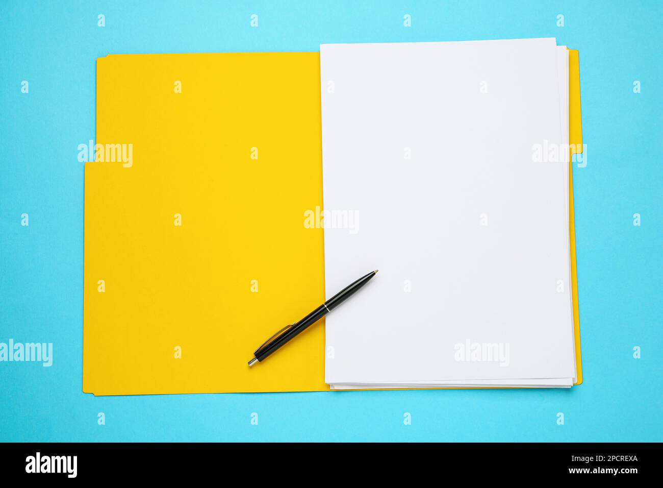 Yellow file with blank sheets of paper and pen on turquoise background ...