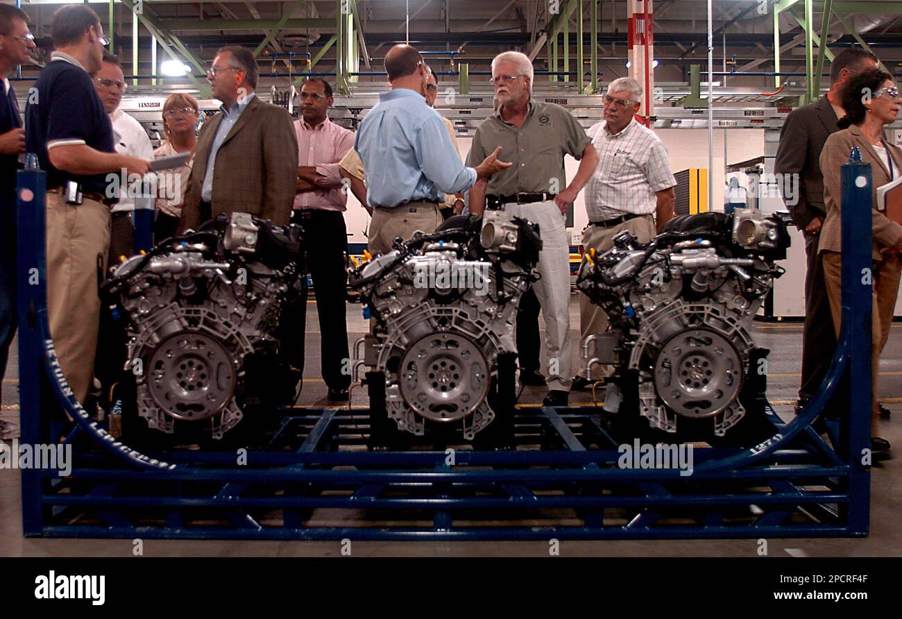 Spectators gather around new engines Thursday, July 20, 2006, during a ...