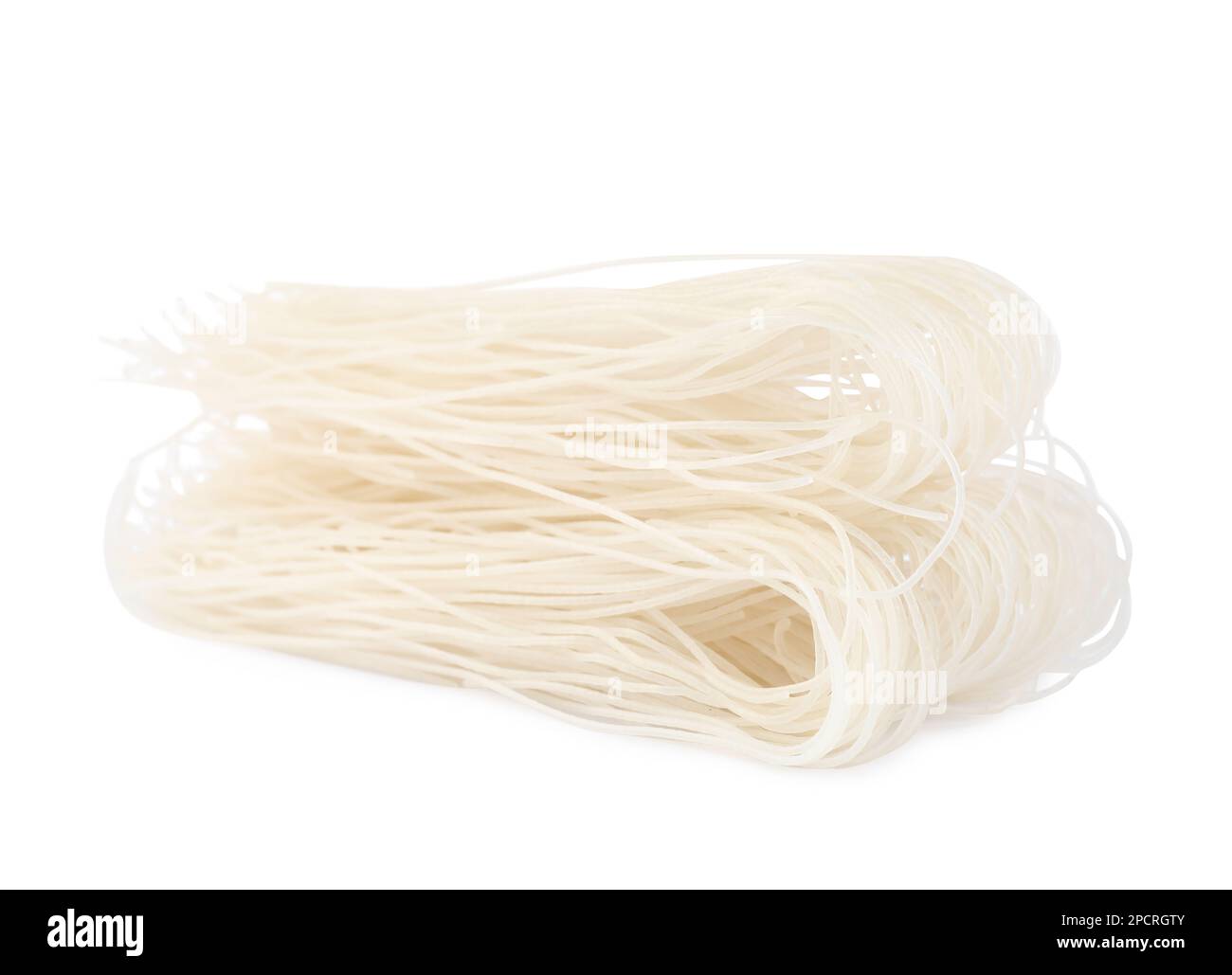 Dried rice noodles isolated on white. East Asian cuisine Stock Photo ...