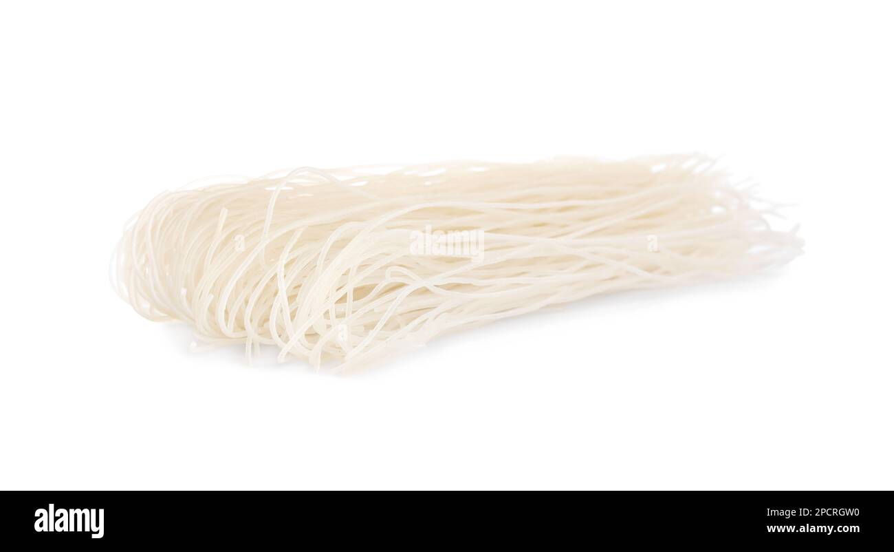 Dried rice noodles isolated on white. East Asian cuisine Stock Photo ...