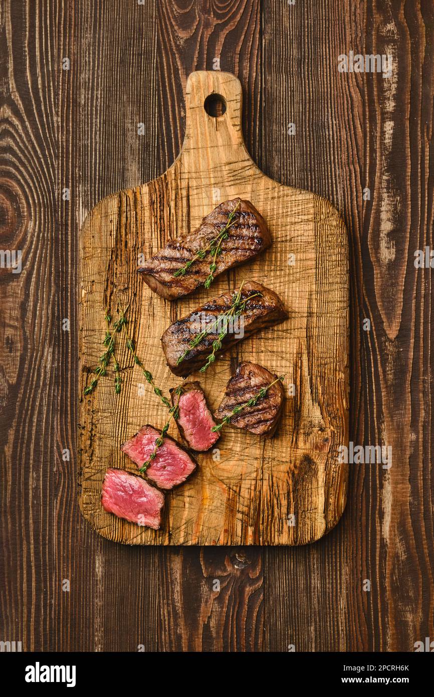 Top view of grilled beef steak, prime strip loin meat Stock Photo - Alamy