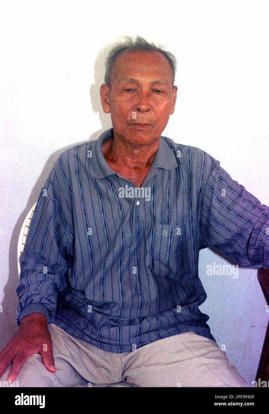 ** FILE ** Captured Khmer Rouge army chief Ta Mok sits in a prison cell ...