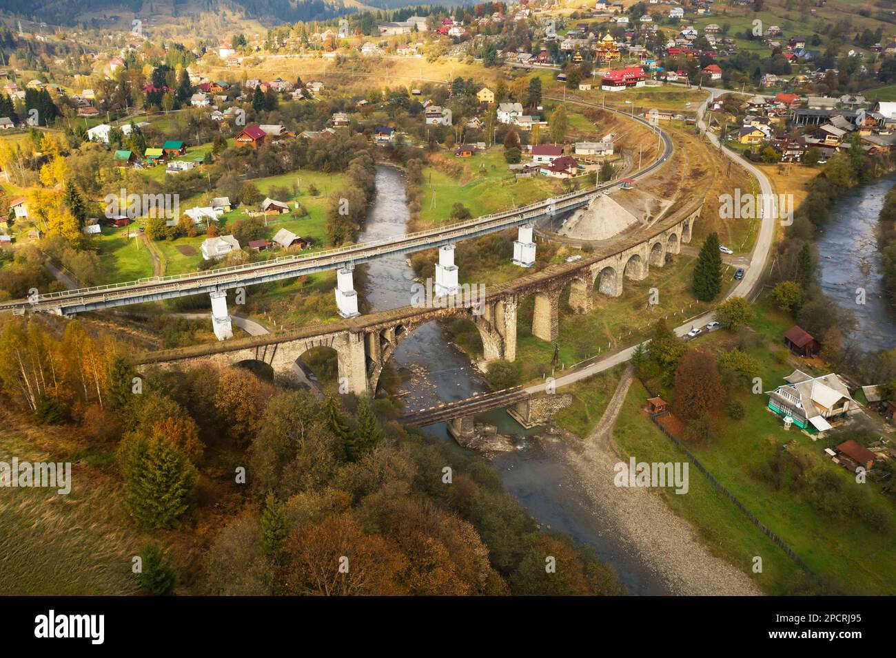 Aerial view of bridges and village on autumn day Stock Photo - Alamy