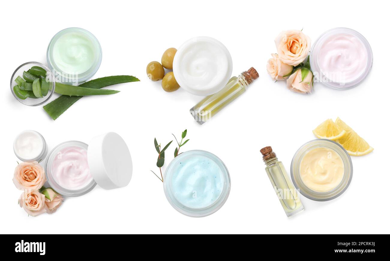 Set with jars of body cream on white background, top view Stock Photo ...