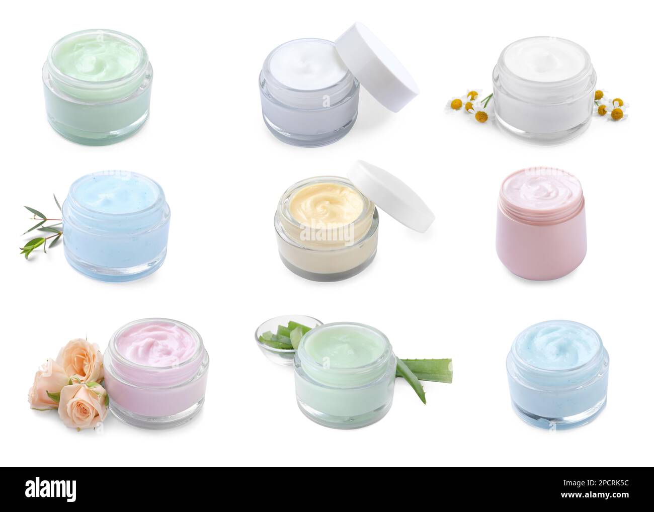Set with jars of body cream on white background Stock Photo - Alamy