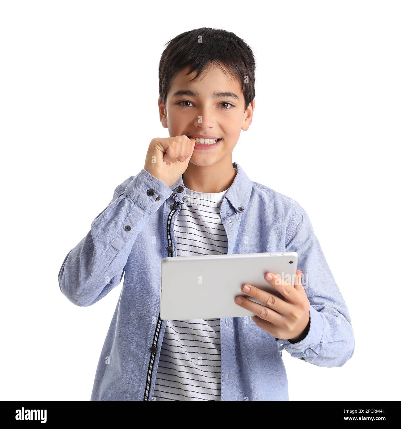 Little boy with tablet computer biting nails on white background Stock ...